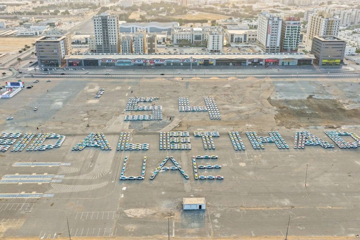 Ajman sets Guinness World Record for largest vehicle phrase with 603 ...